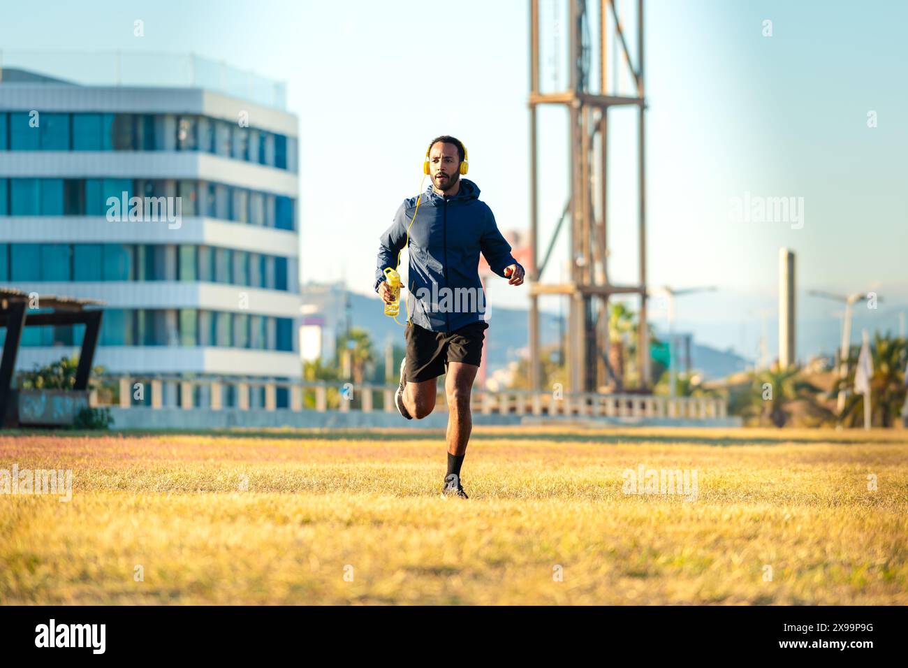 Black men running hi-res stock photography and images - Alamy