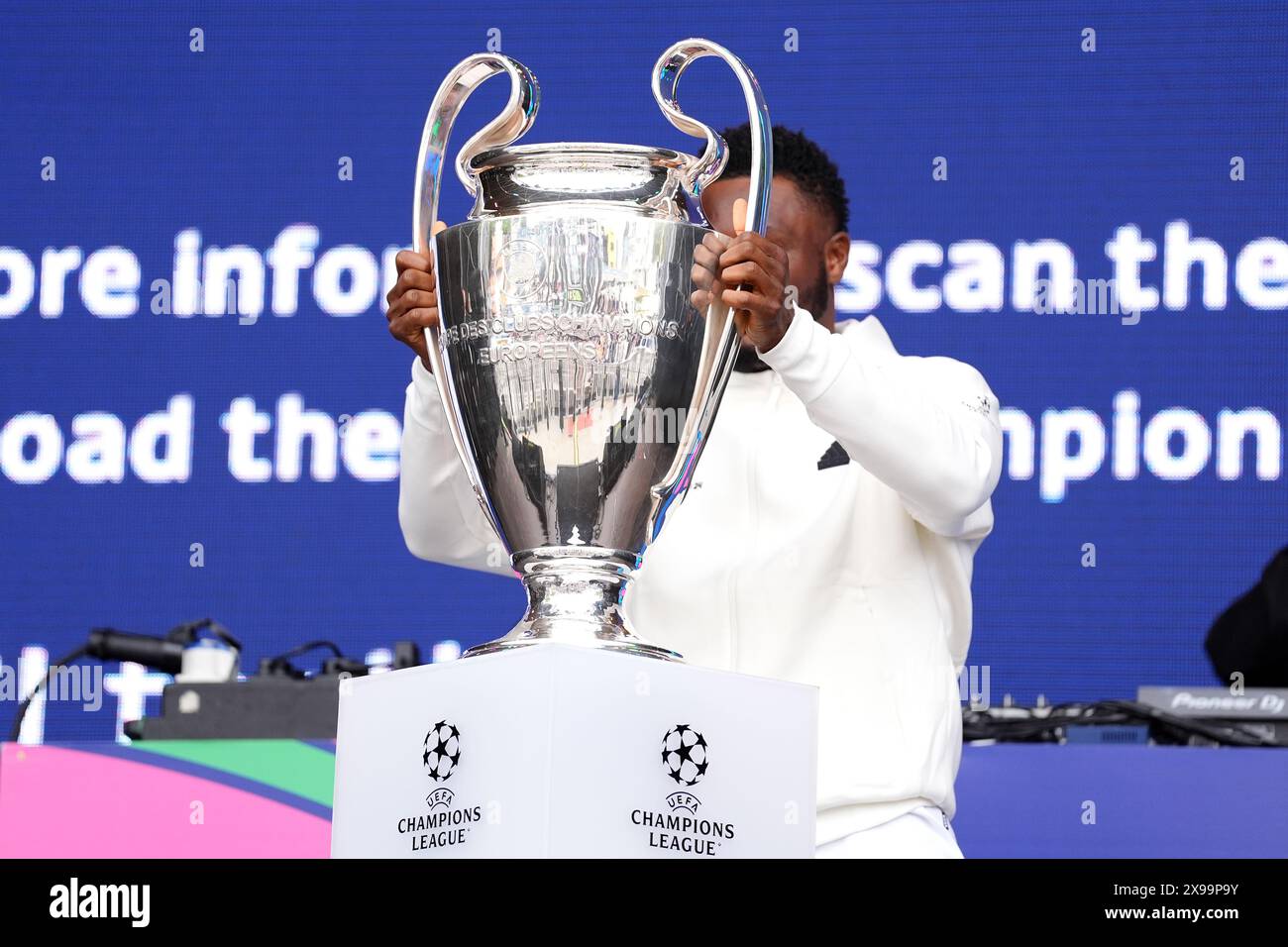 UEFA ambassador Mikel John Obi with the UEFA Champions League trophy ...