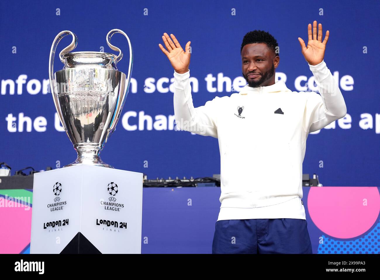 UEFA ambassador Mikel John Obi with the UEFA Champions League trophy ...
