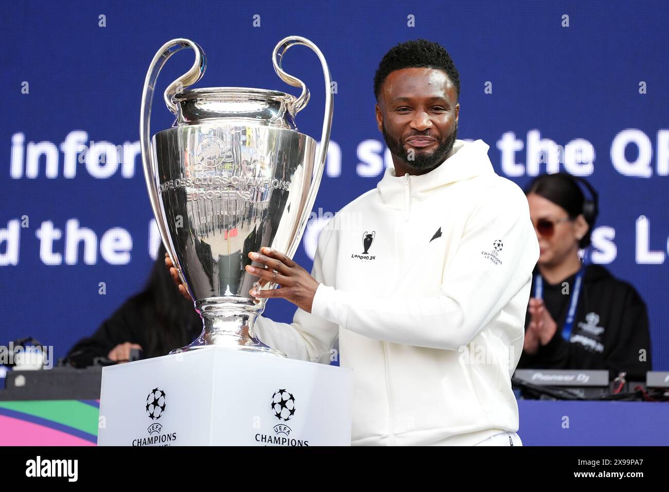 UEFA ambassador Mikel John Obi with the UEFA Champions League trophy ...