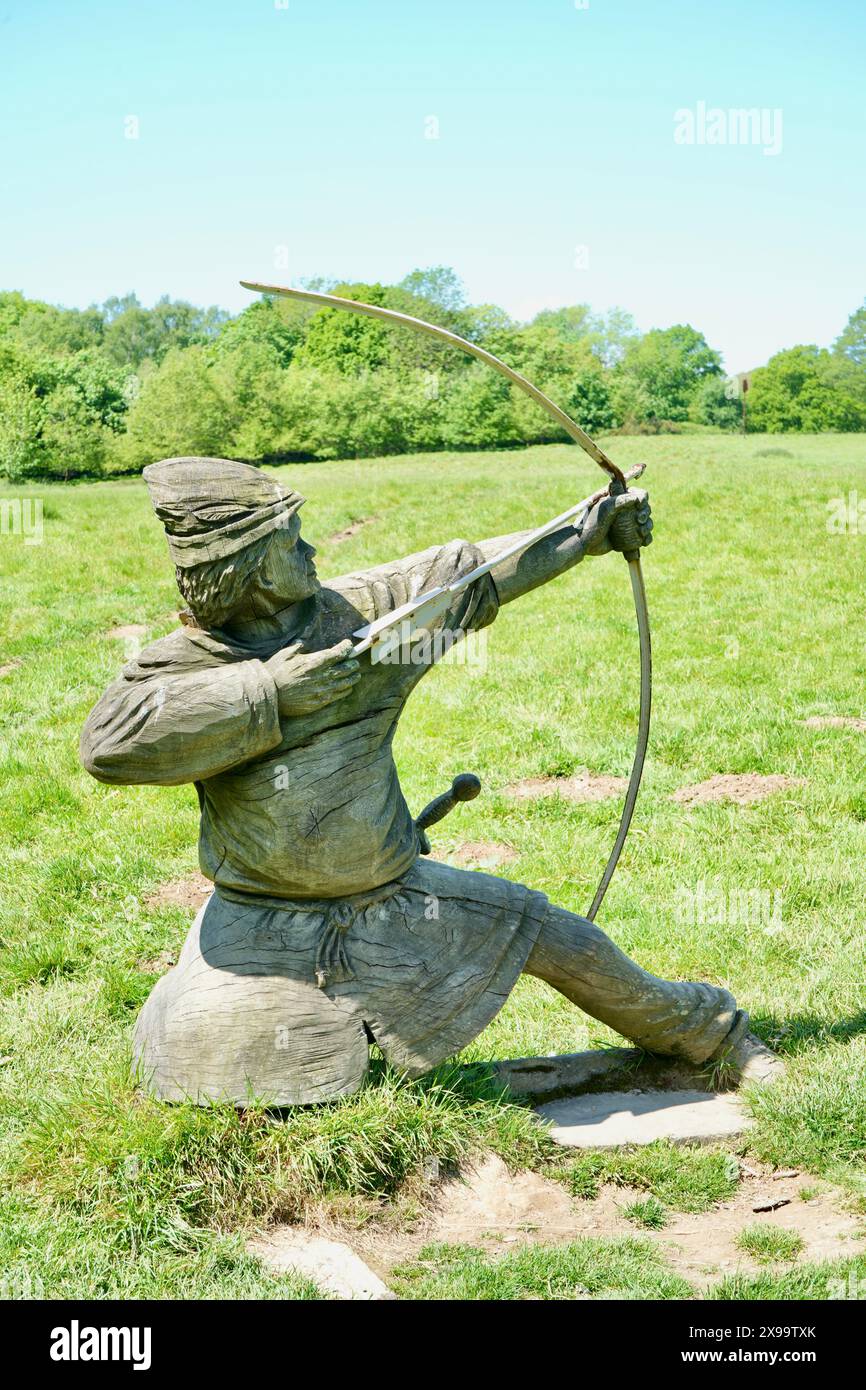 Carved wooden figure with a bow and arrow at The Battle of Hastings ...