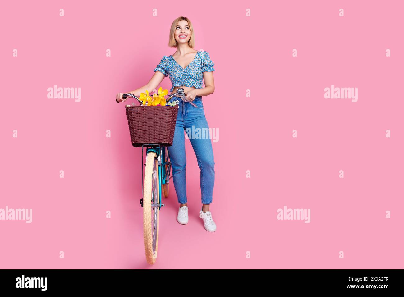Full size photo of pretty young girl look empty space bike wear top ...