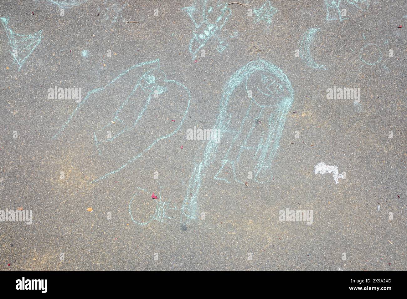 children's drawings on the floor of a school backyard Stock Photo - Alamy