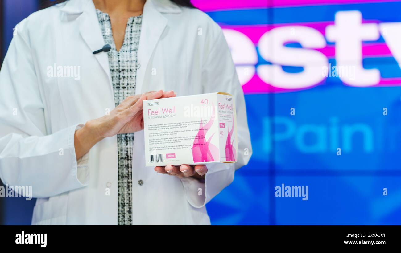 TV Show Product Infomercial: Professional Holds Package Box with Health ...