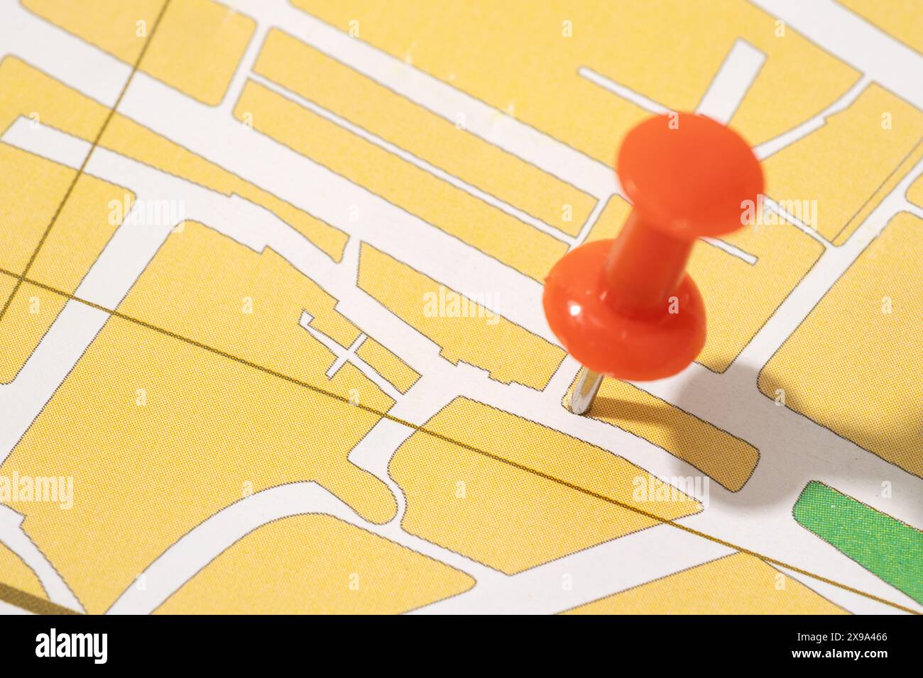 Thumbtack on a paper city map. Map location concept Stock Photo - Alamy