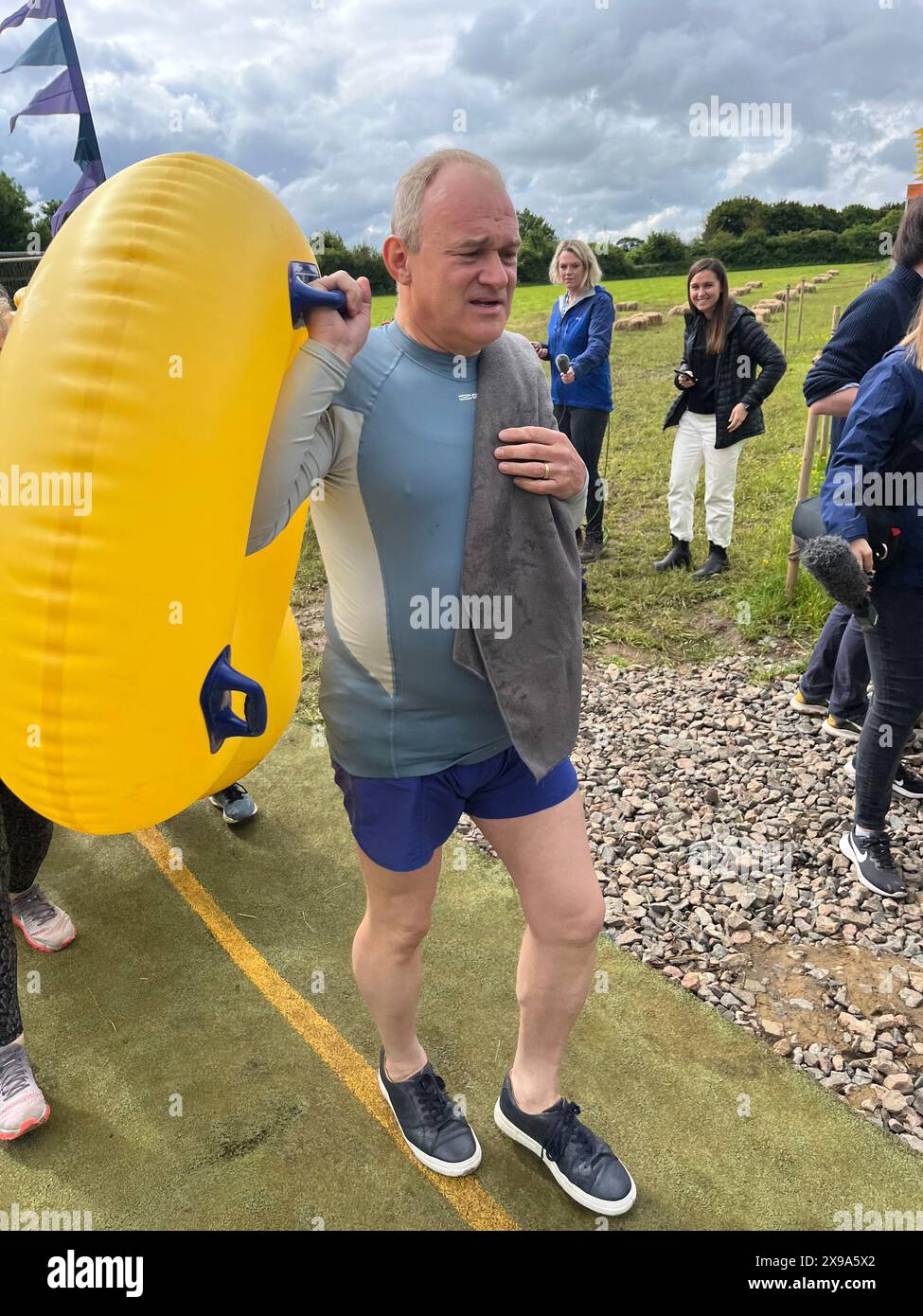 Leader of Liberal Democrats Sir Ed Davey making his to ride down the ...
