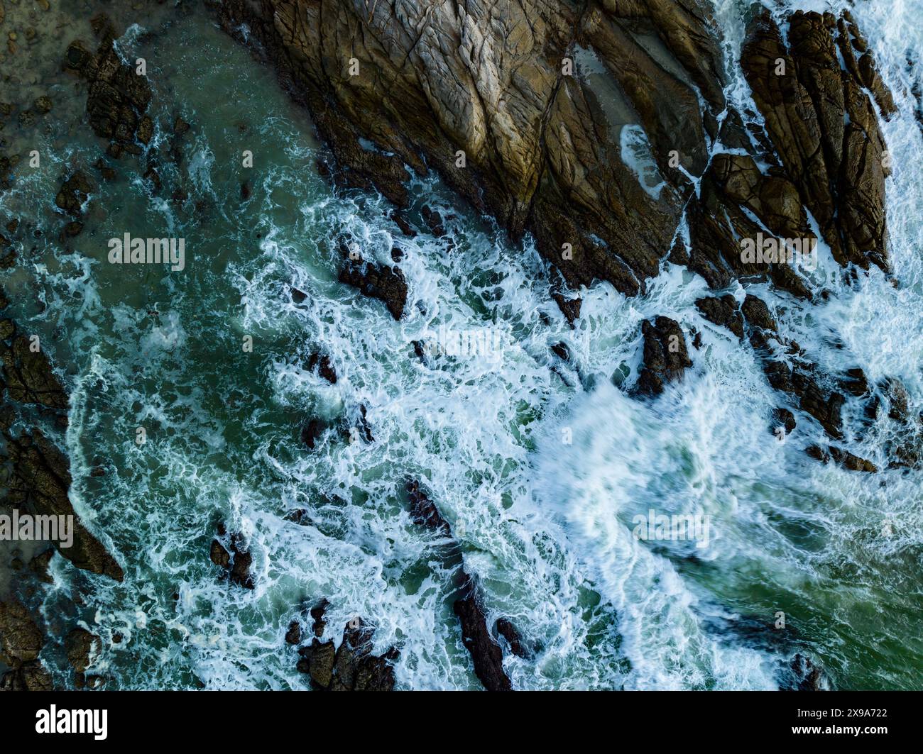 Bird eye view seashore with big wave crashing on rock cliff. Beautiful ...