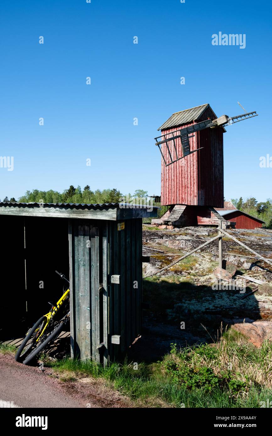 LUMPARBY, LUMPARLAND, ÅLAND: A bus stop with two bicyles and a wind ...