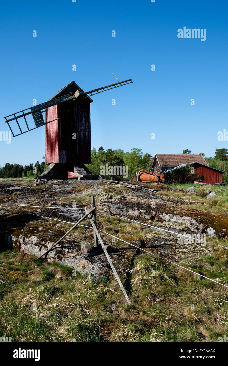 BROKEN WINDMILL, LUMPARLAND, ÅLAND: A wind damaged windmill on a farm ...