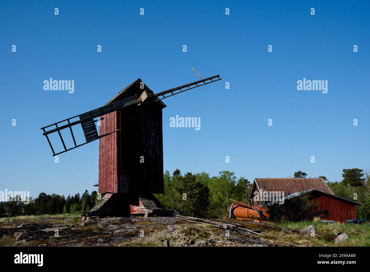 WINDMILL, LUMPARLAND, ÅLAND: A wind damaged windmill on a farm in the ...