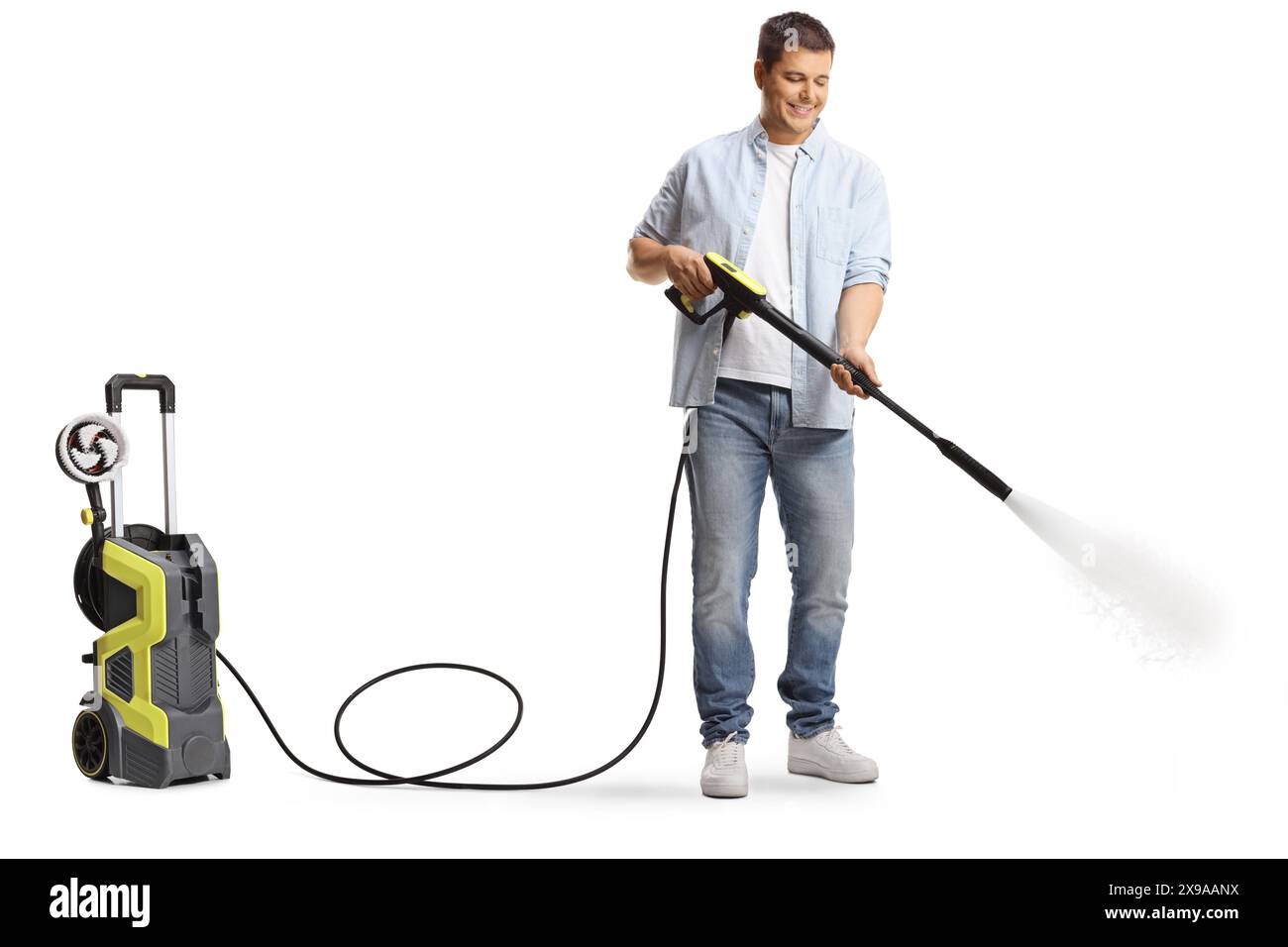 Man cleaning with a high pressure washer machine isolated on white ...