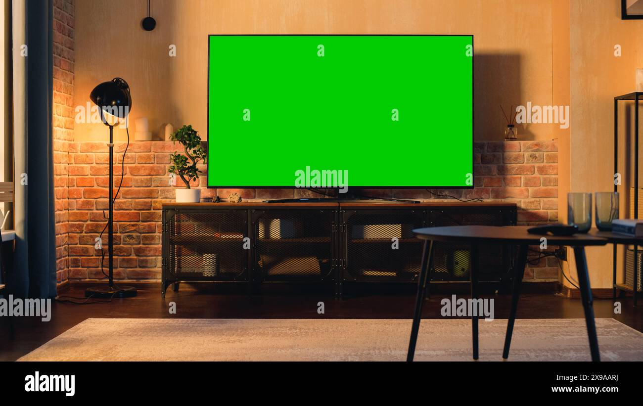Stylish Loft Apartment Interior with TV Set with Green Screen Mock Up ...