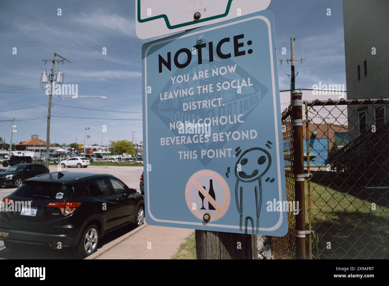 A sign indicating the boundary of the social district with alcoholic ...