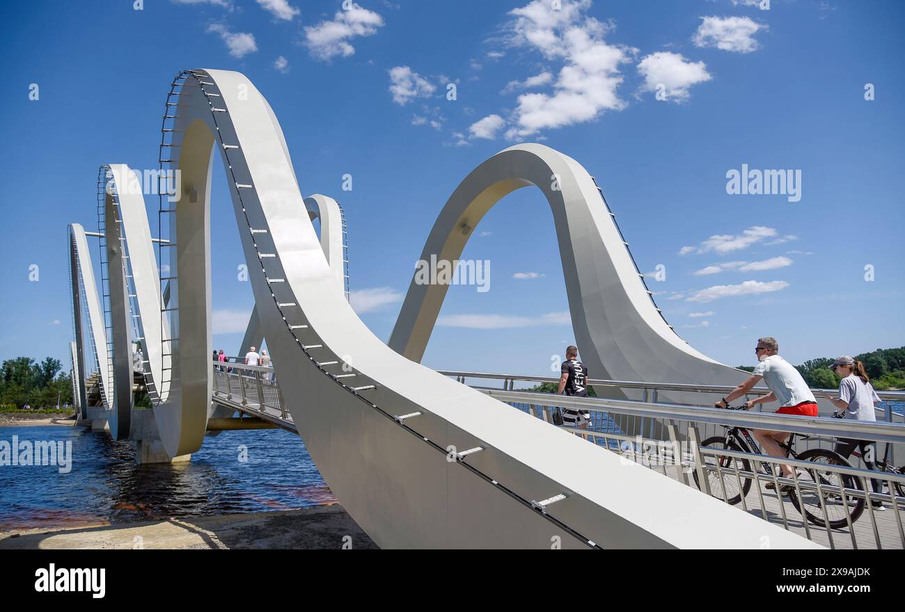 KYIV, UKRAINE - MAY 27, 2024 - People ride bicycles along the new ...