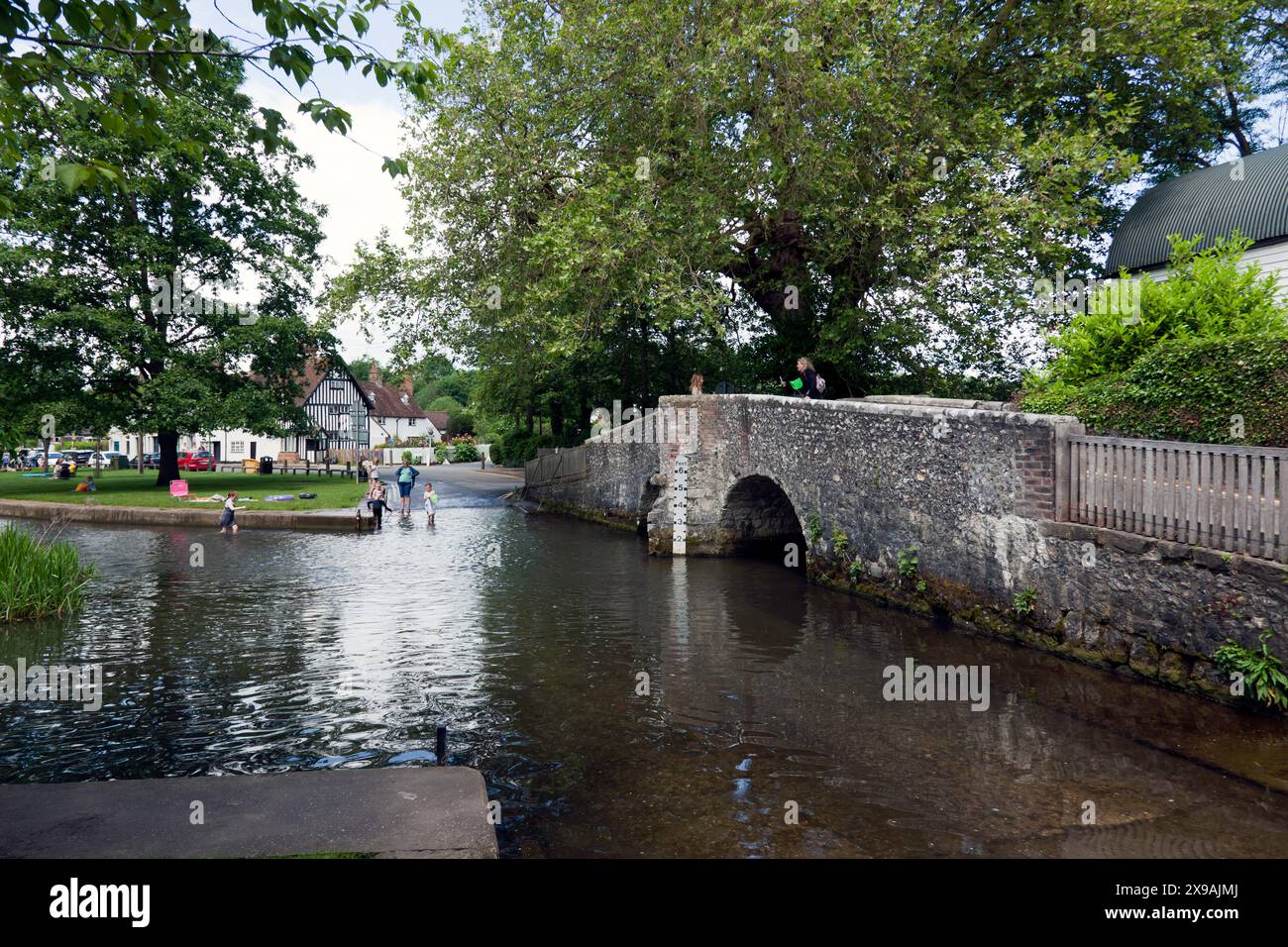 A ford over the river Darent, with a picturesque hump-back bridge ...