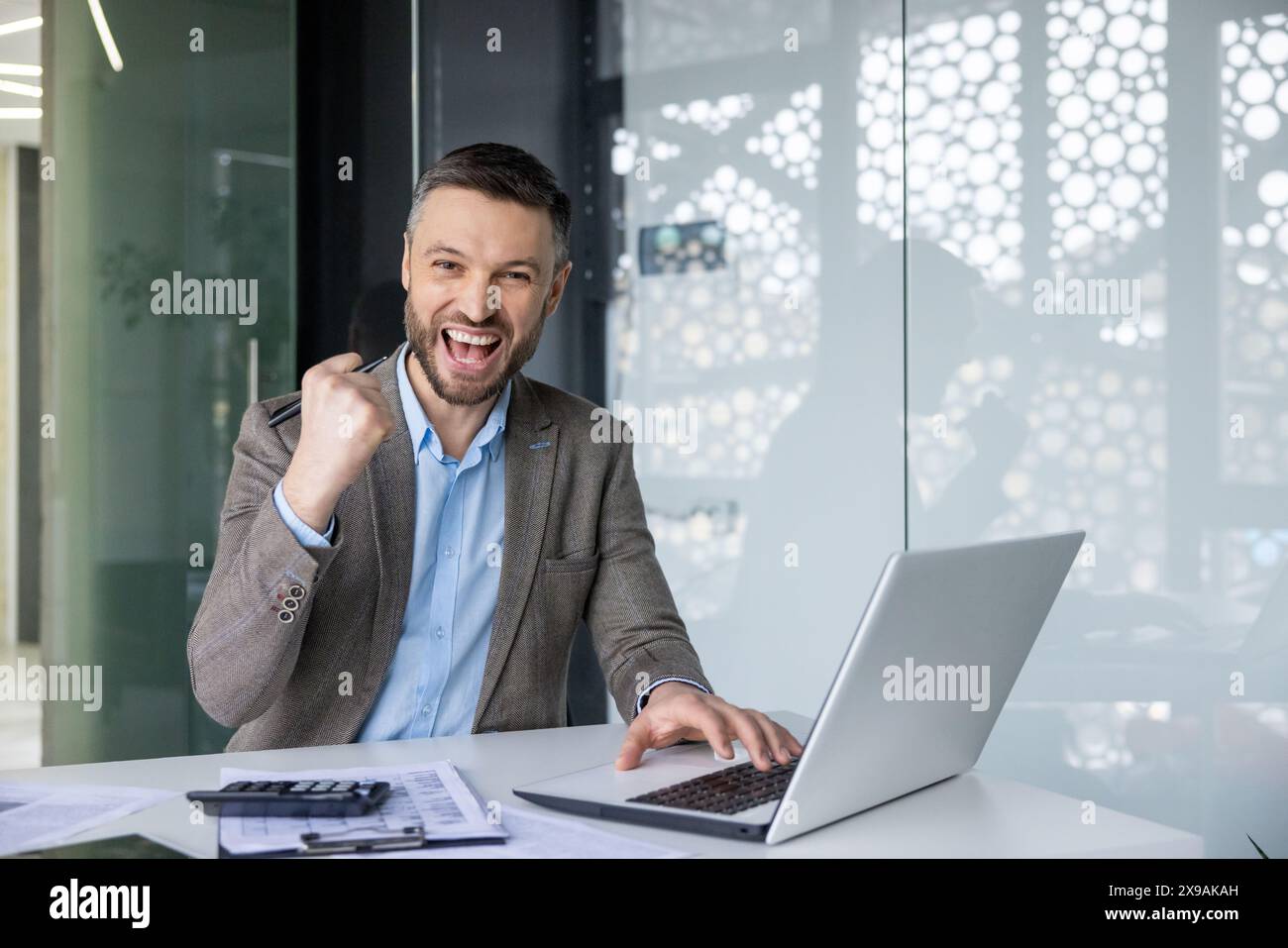 Mature businessman fist pump hi-res stock photography and images - Alamy