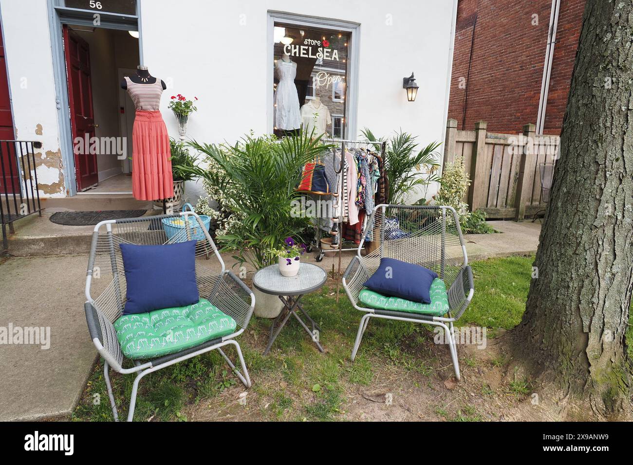 The clothes are on display outside o the store Stock Photo - Alamy
