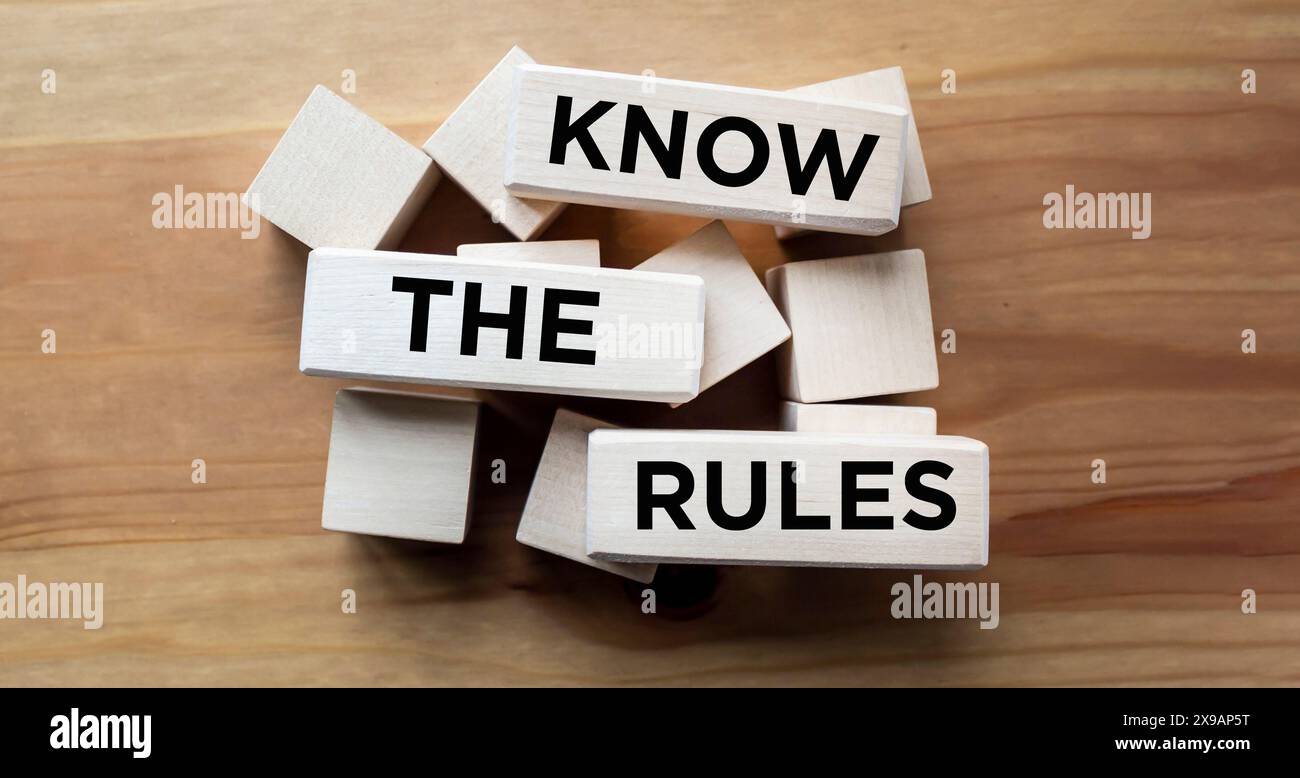 Know the rules word on wooden blocks isolated on wooden background ...