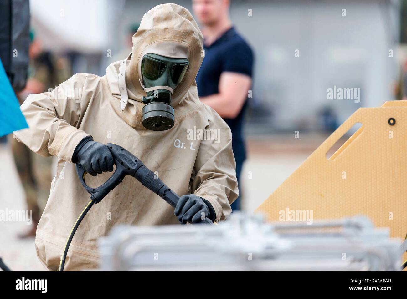 German soldiers of an NBC defense unit in protective clothing practice ...