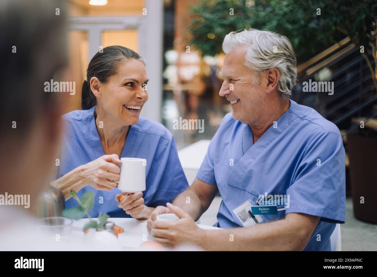 Team smiling doctors having hi-res stock photography and images - Alamy