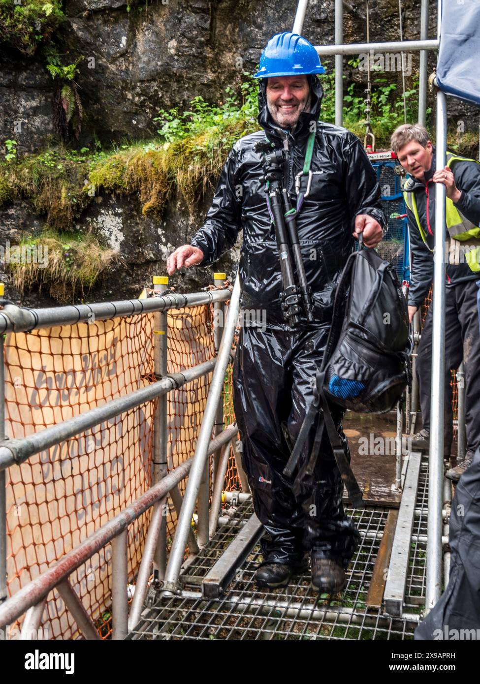 The image is of one of many people taking part to descent into Gaping ...