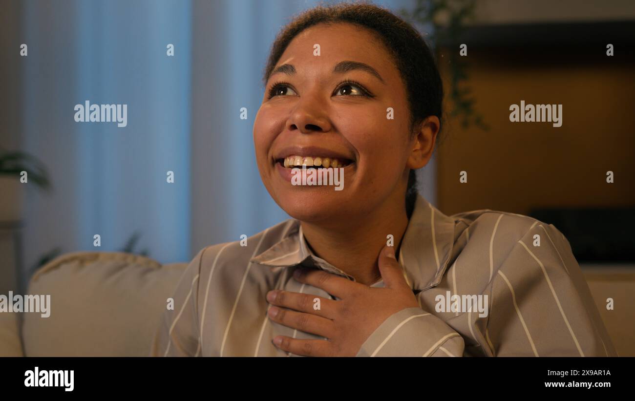 Surprised shocked happy African American woman ethnic girl homeowner on ...