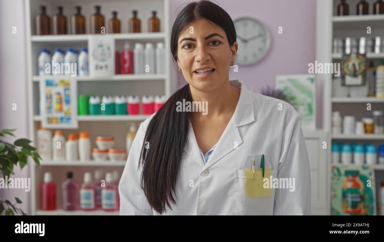 Female pharmacist wearing lab hi-res stock photography and images - Alamy