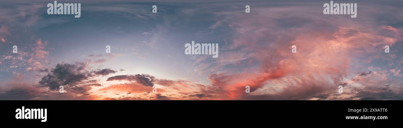 Sunset sky panorama with bright glowing pink Cumulus clouds. HDR 360 ...