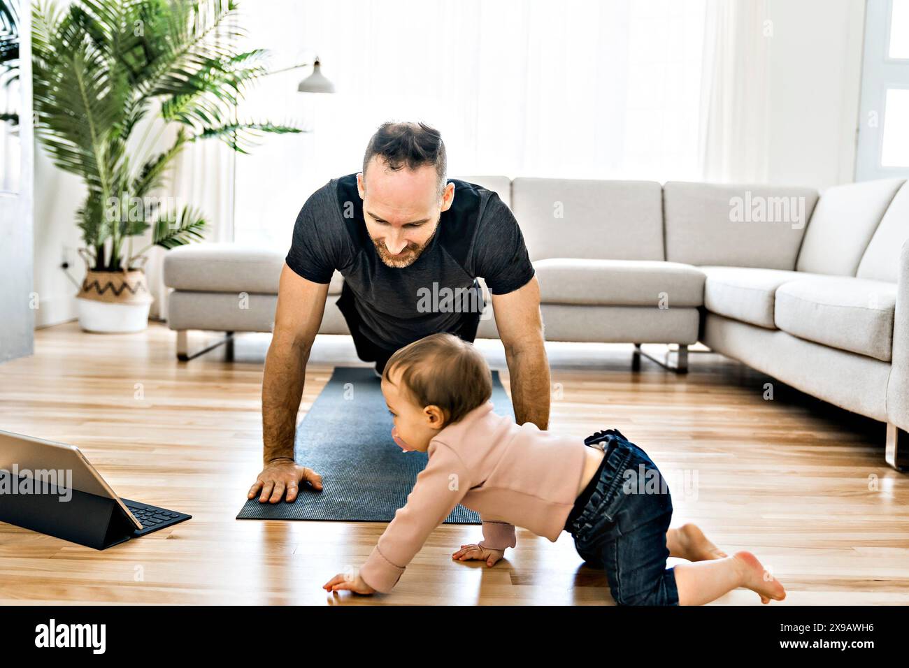 father training with his baby at home Stock Photo - Alamy