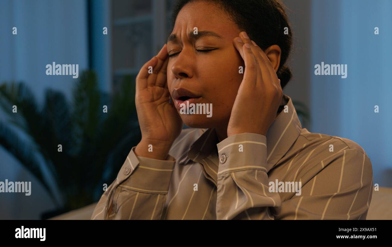 Night headache sick woman massaging hi-res stock photography and images ...