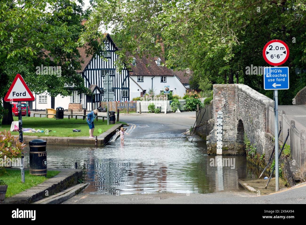 A ford over the river Darent, with a picturesque hump-back bridge ...