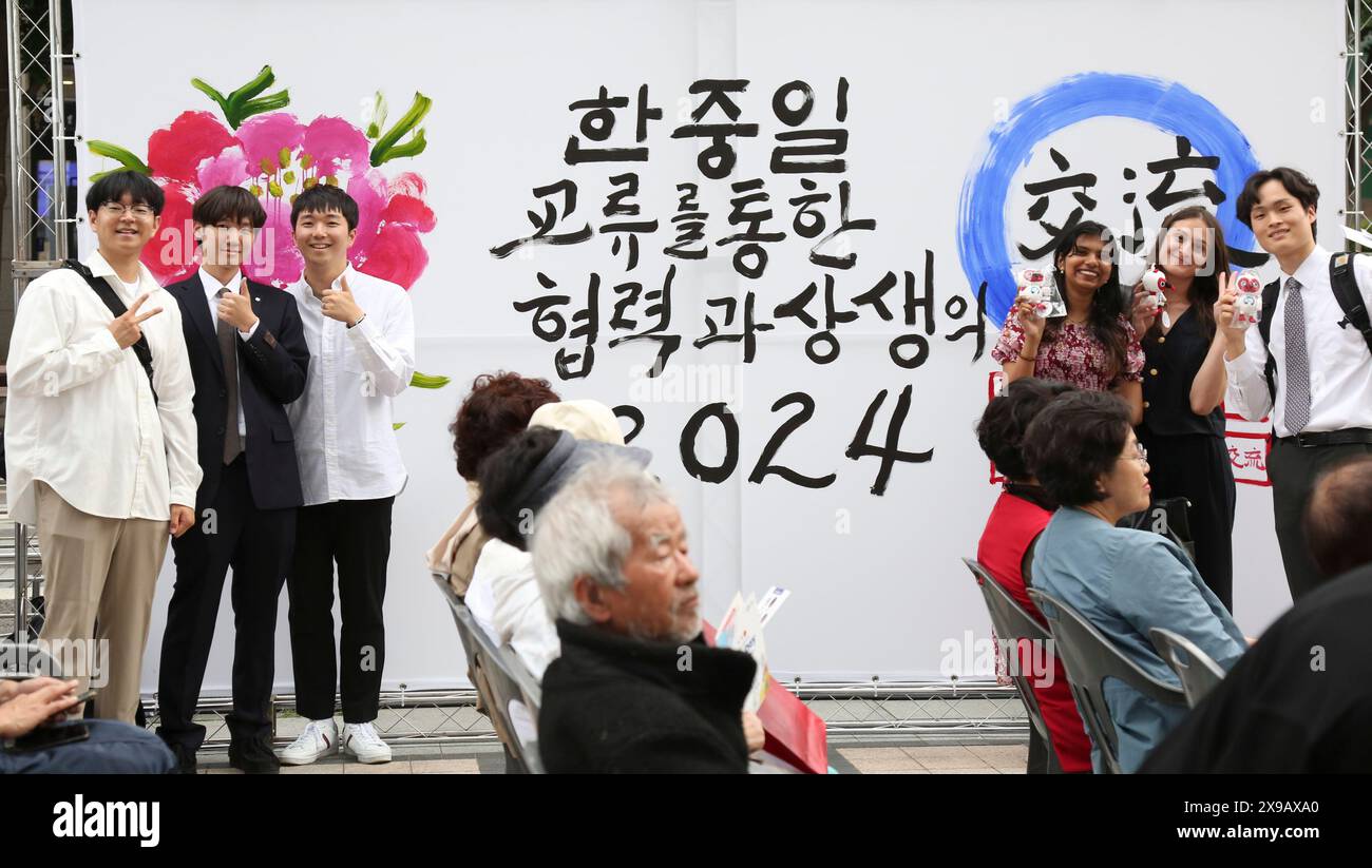Seoul, South Korea. 30th May, 2024. Young people pose for a group photo ...