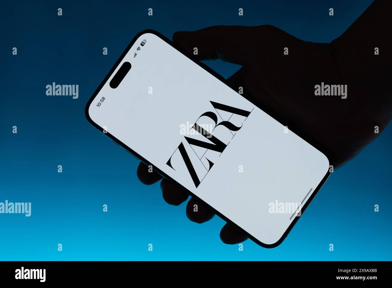 New York, USA - May 6, 2024: Open ZARA app on smartphone in hand ...