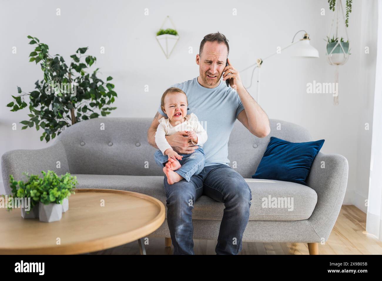 Newborn baby happy father phone hi-res stock photography and images - Alamy