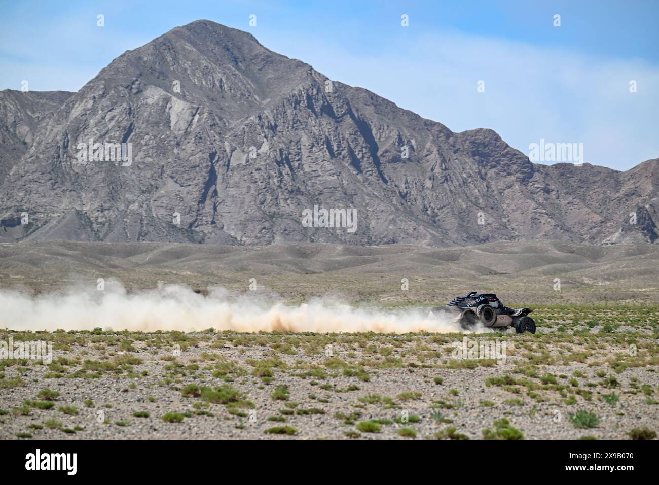 Aksu. 30th Mar, 2024. Driver Ma Yuan and his pilot Tian Yu of China ...