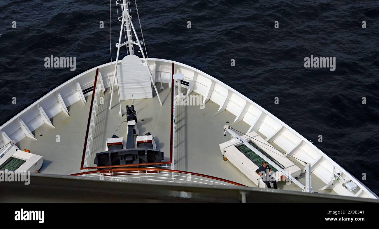 A crew member on Cunard’s new cruise ship “Queen Anne” takes a break on ...