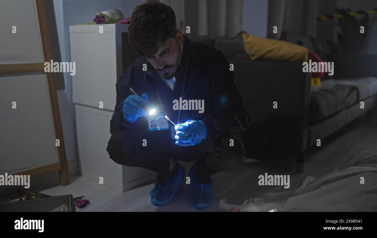 A man examines evidence at a dimly lit crime scene in an apartment's ...