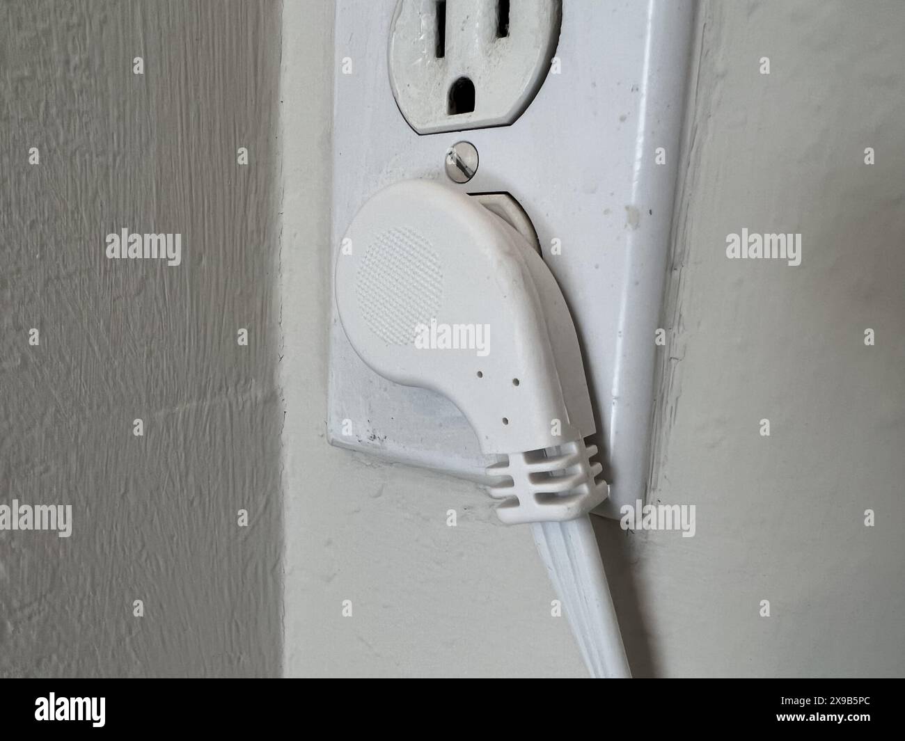 United States. 20th Jan, 2022. Offset electrical plug in outlet ...