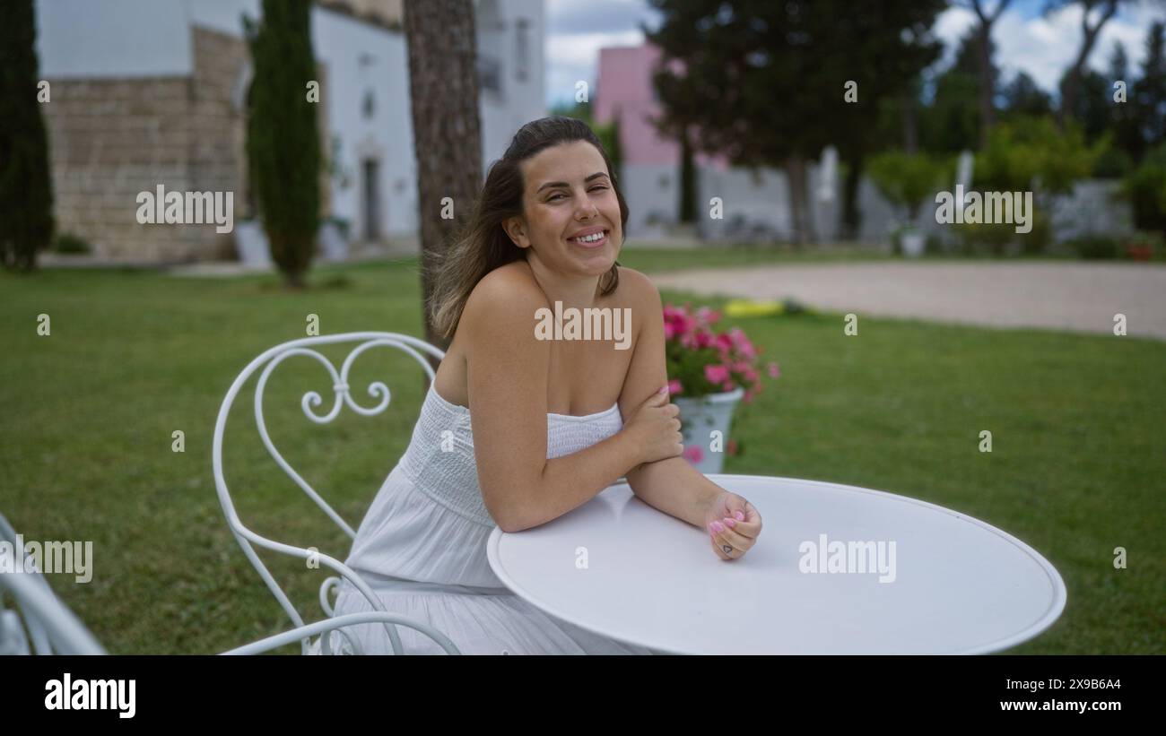 A beautiful young hispanic woman enjoying the outdoors at a villa in ...