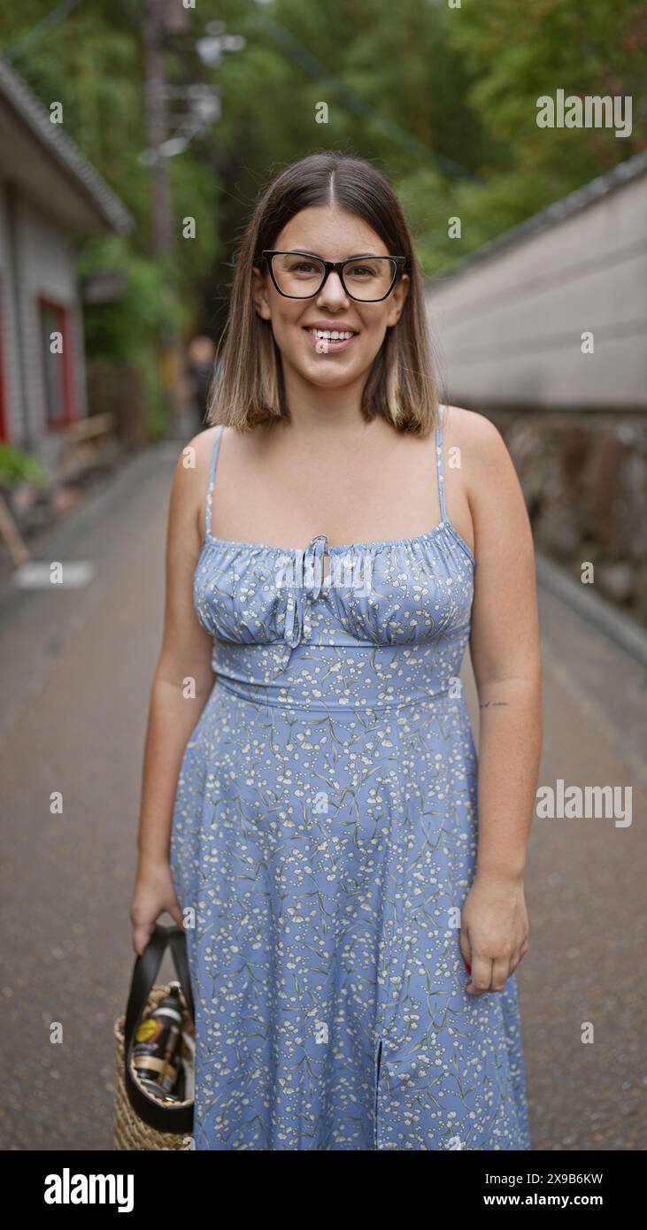 Confident hispanic woman, beautiful and joyful, cheerfully posing with ...