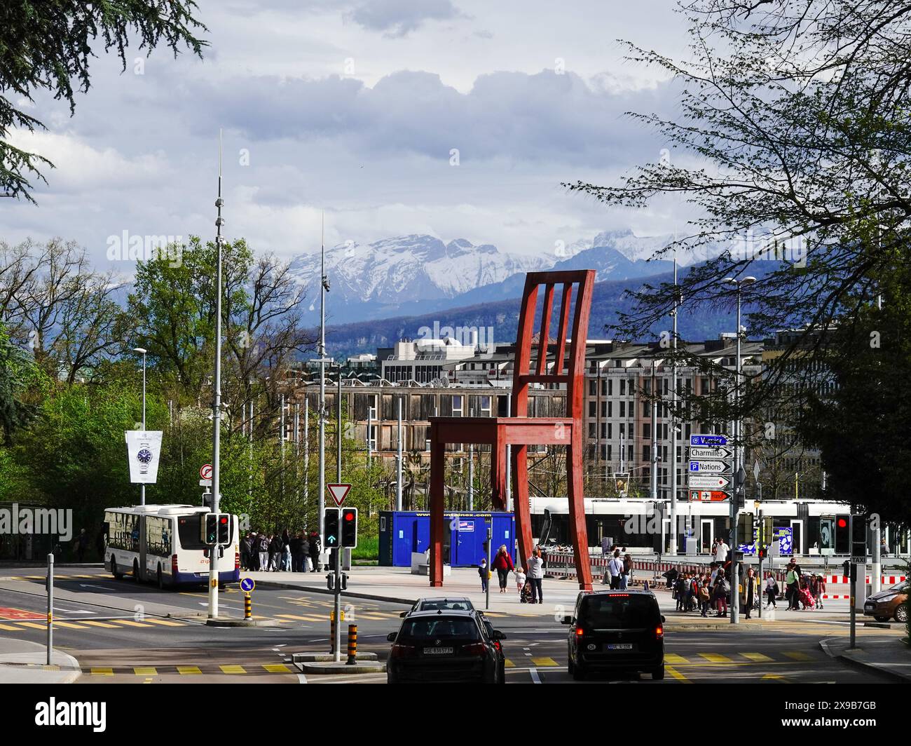 People viewing the Giant chair with broken leg, across from the Palace ...