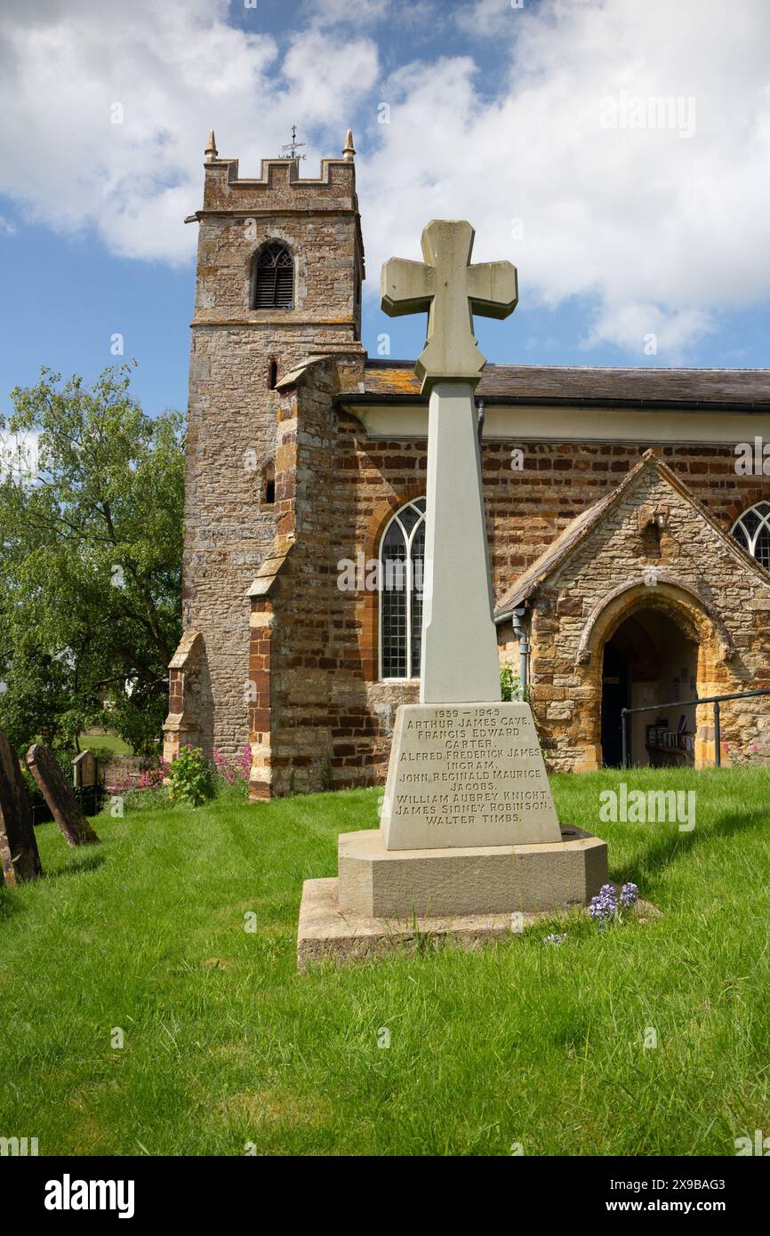 The war memorial and St. Margaret`s Church, Denton, Northamptonshire ...