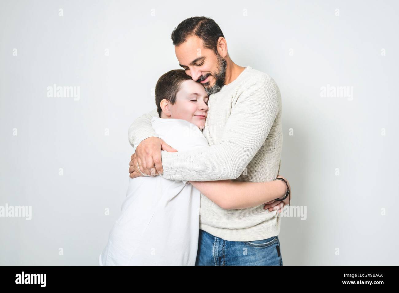 nice and cool Father and son on studio Stock Photo - Alamy