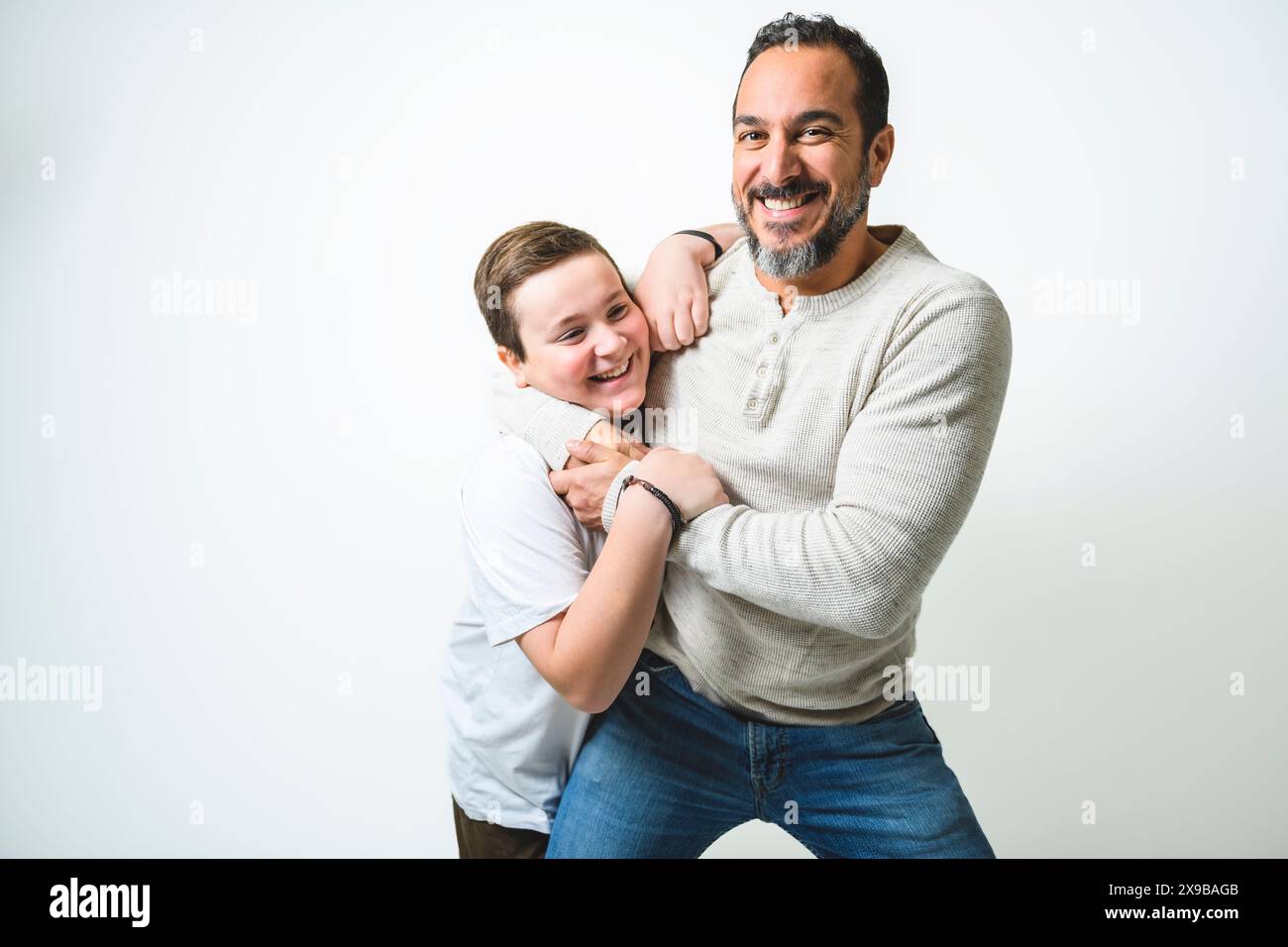 nice and cool Father and son on studio Stock Photo - Alamy