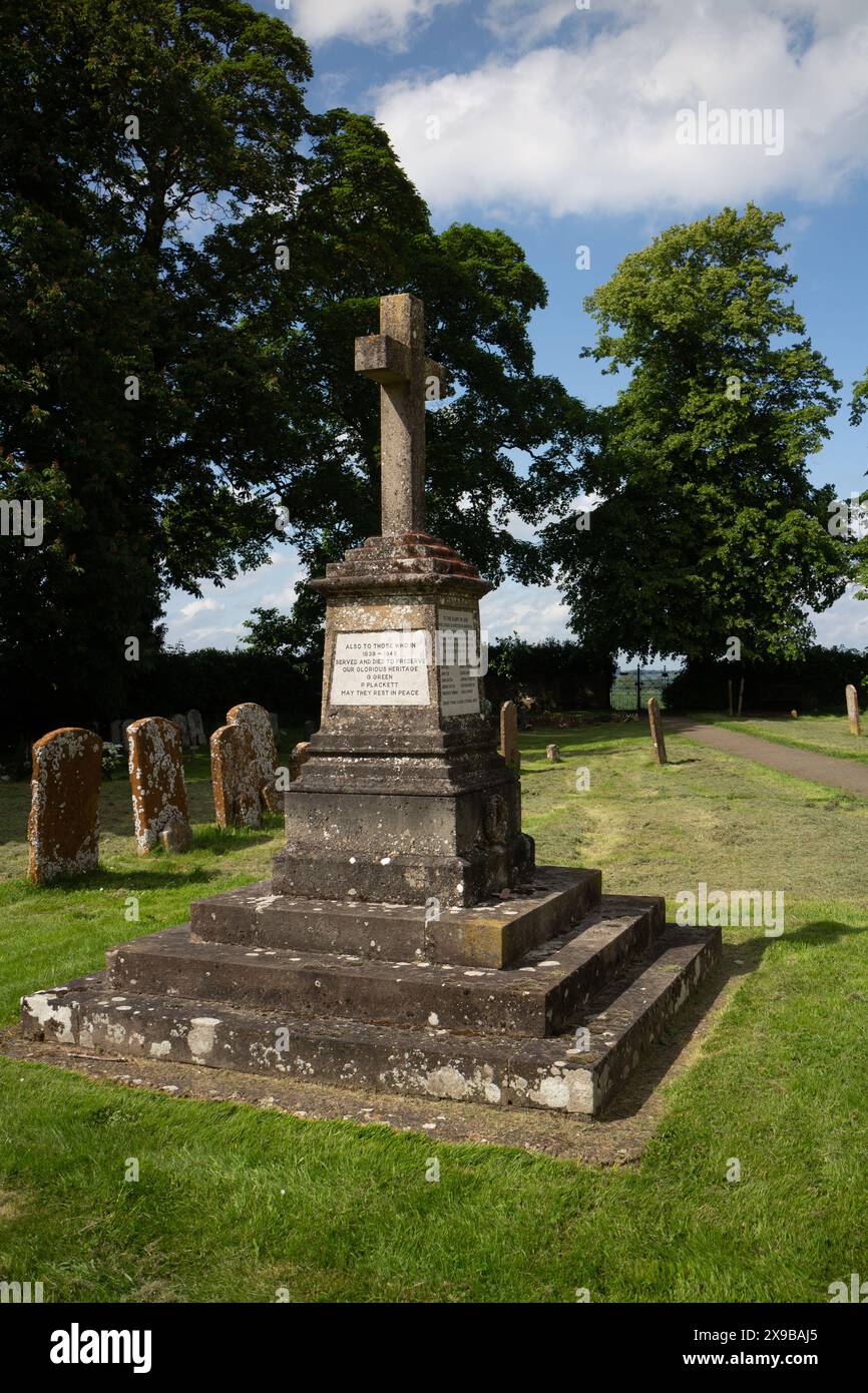 The war memorial, St. Laurence`s churchyard, Brafield on the Green ...