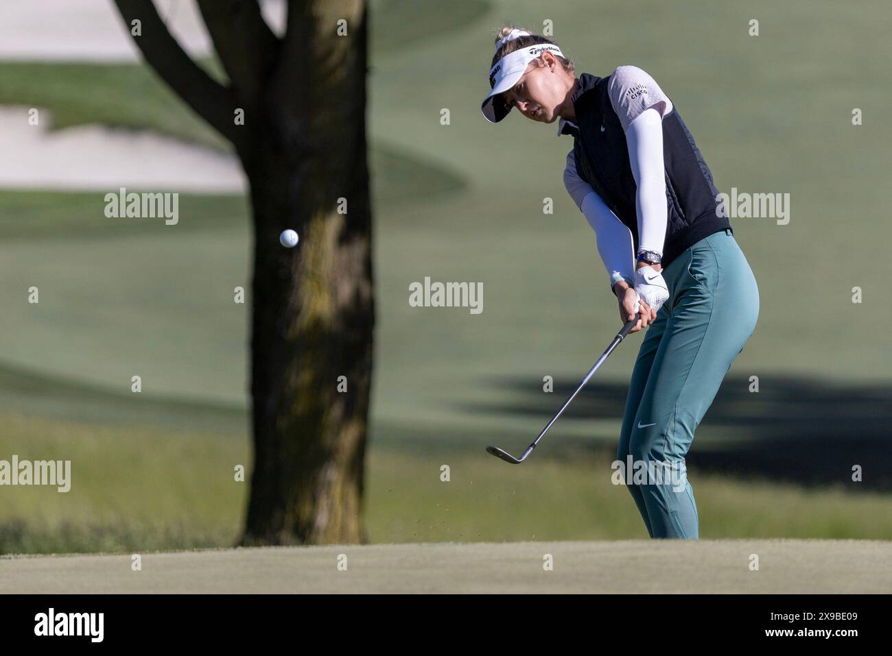 Philadelphia, United States. 30th May, 2024. Nelly Korda chips the ball ...