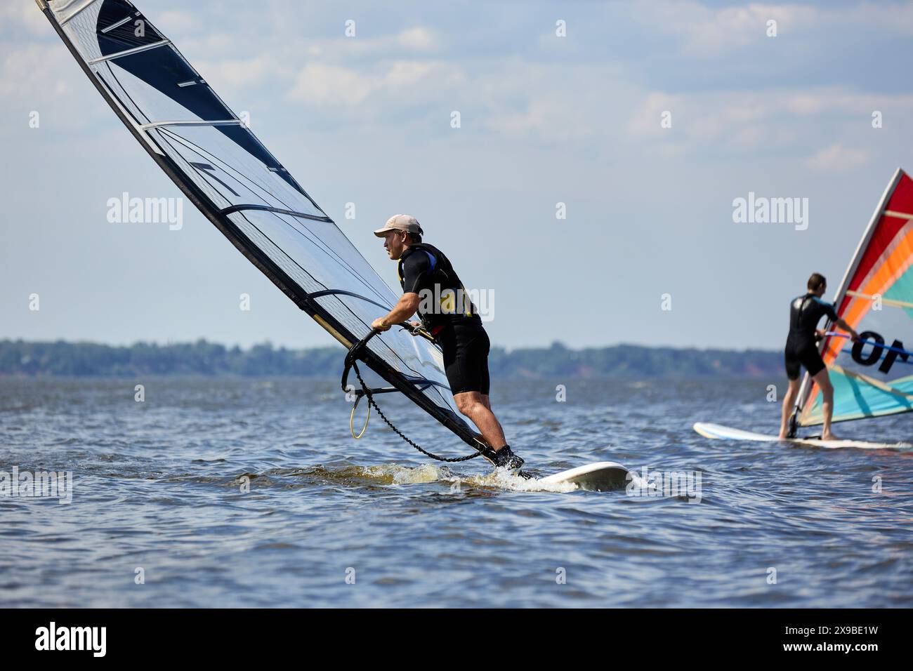 Two windsurfers in action moving opposite directions Stock Photo - Alamy Two windsurfers in action moving opposite directions Stock Photo - Alamy