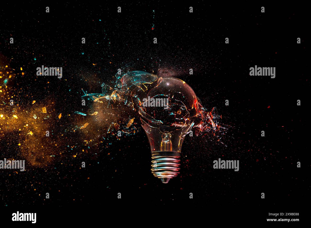 High-speed light bulb exploding fragments and sparks Stock Photo - Alamy