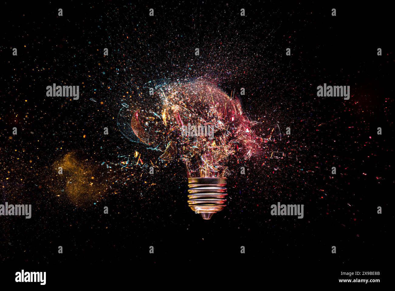 High-speed photo explosion light bulb dark background Stock Photo - Alamy