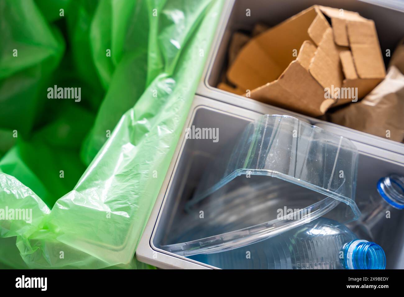 Household bins for waste sorting in the kitchen for recycle. Plastic ...